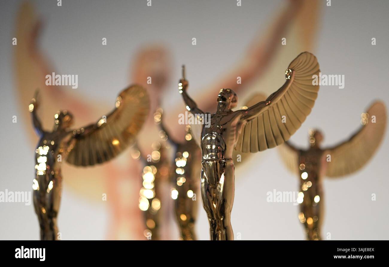 Hamburg, Germany. 10th Apr, 2025. The prizes are displayed on a table ...