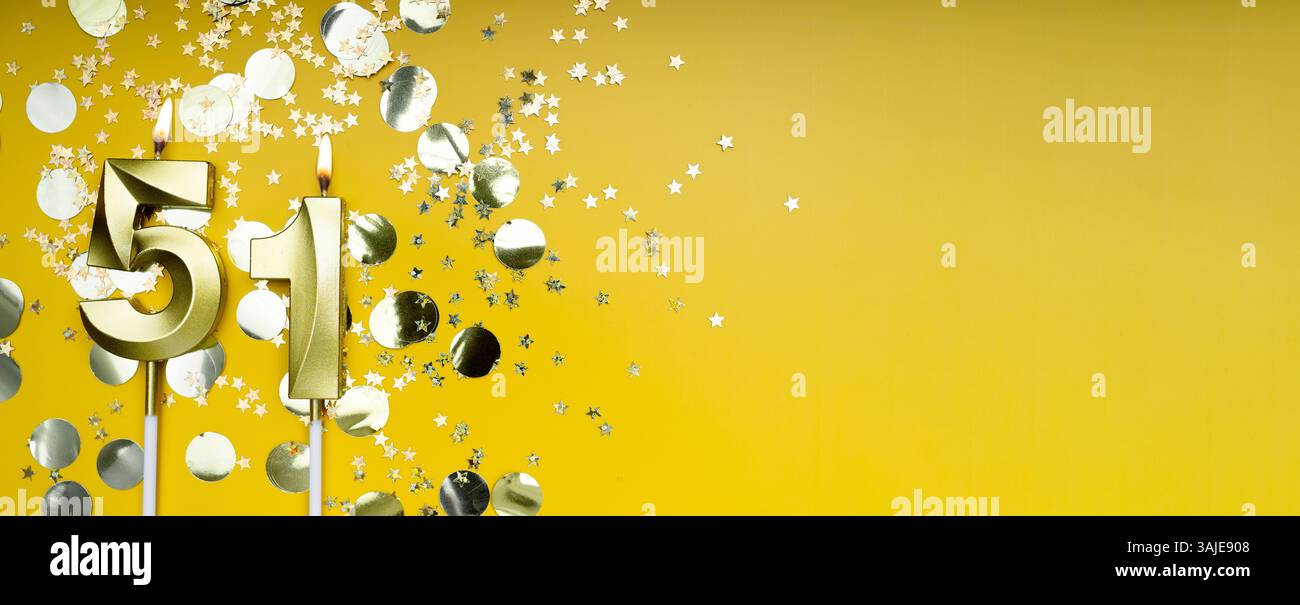 Golden candle number fifty-one on yellow background. Birthday card with ...