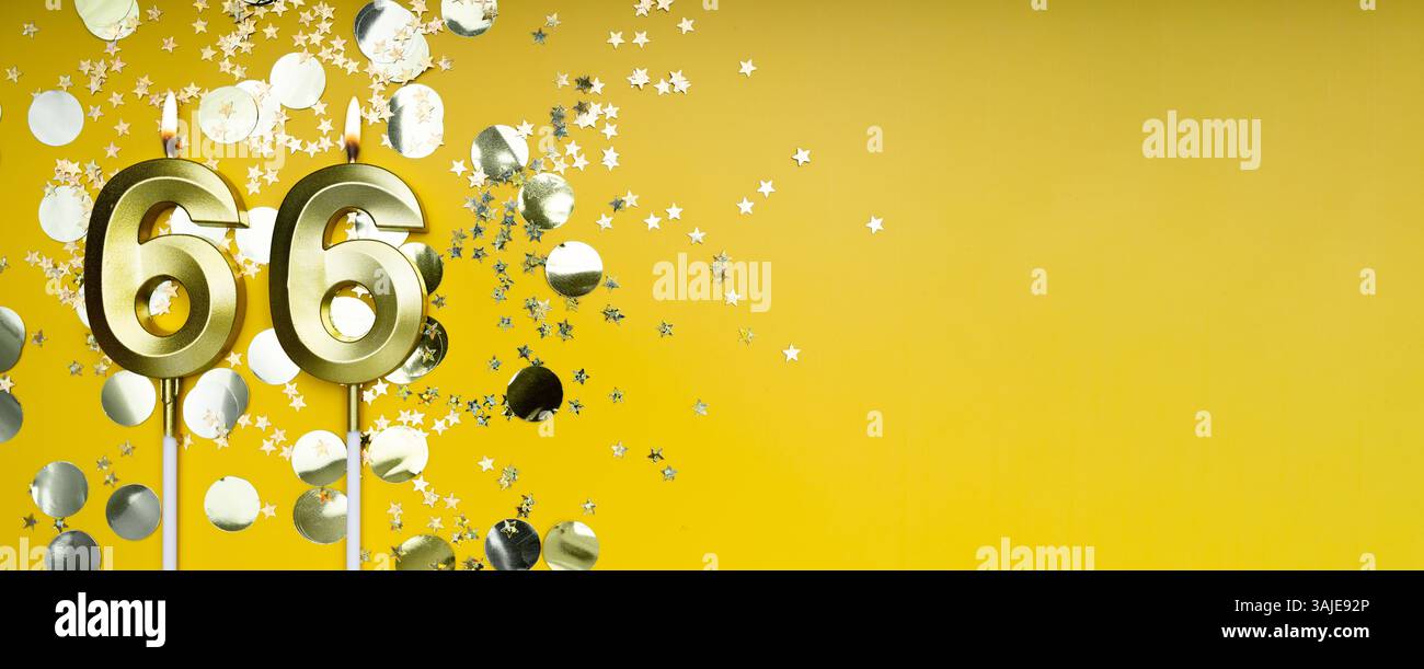 Sixty-six years birthday. Number 66 golden celebration candle. Yellow ...
