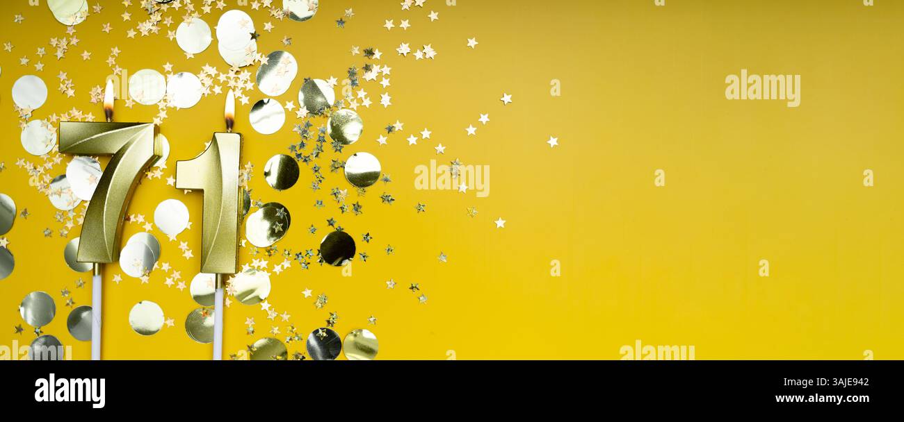 Seventy-one years birthday. Number 71 golden celebration candle. Yellow ...