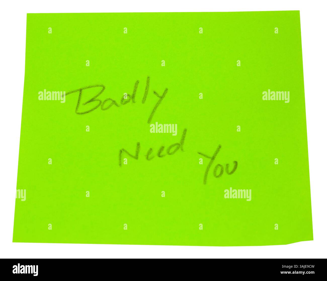 Hand written Badly need you in a green paper Stock Photo - Alamy