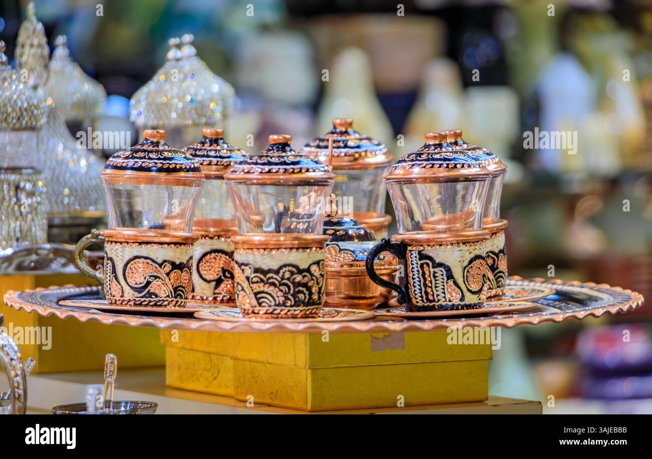 Display of traditional Turkish tea and coffee sets with intricate ...