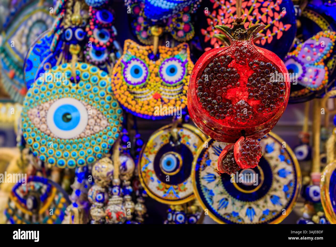 Colorful Turkish souvenirs, evil eye charms, decorative plates, and a ...