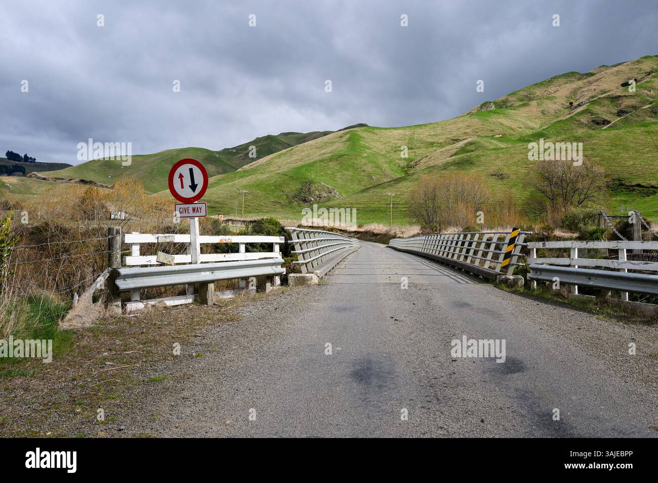 Giving Way sign on one way bridge. North Island. New Zealand Stock ...