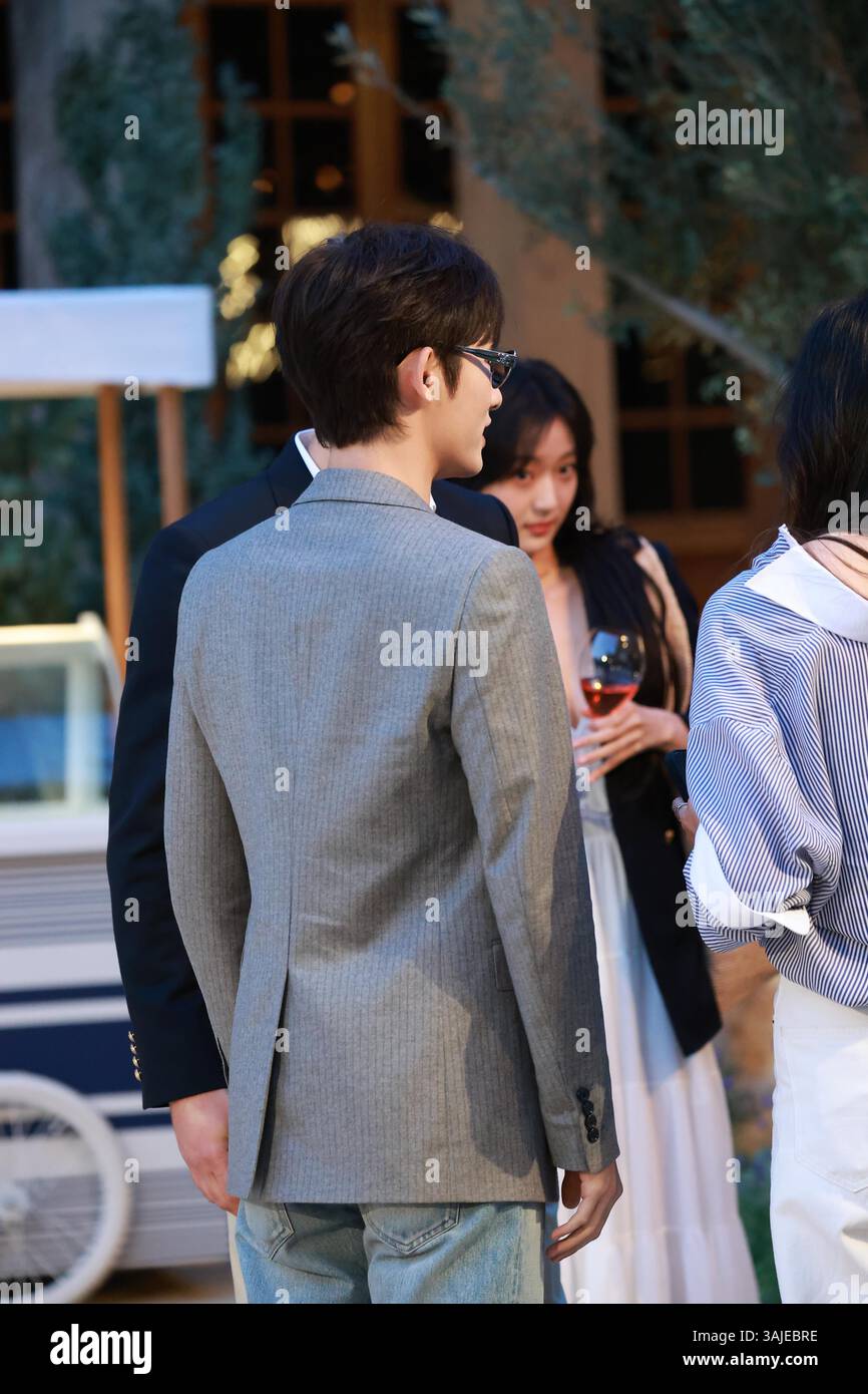 Chinese singer and actor Dong Sicheng attends an activity in Shanghai, China, 10 April, 2025 ...