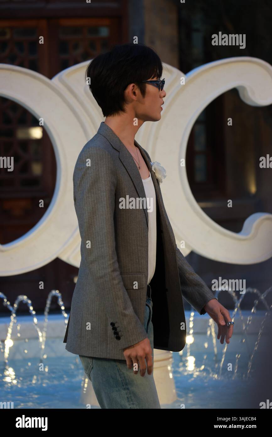 Chinese singer and actor Dong Sicheng attends an activity in Shanghai, China, 10 April, 2025 ...