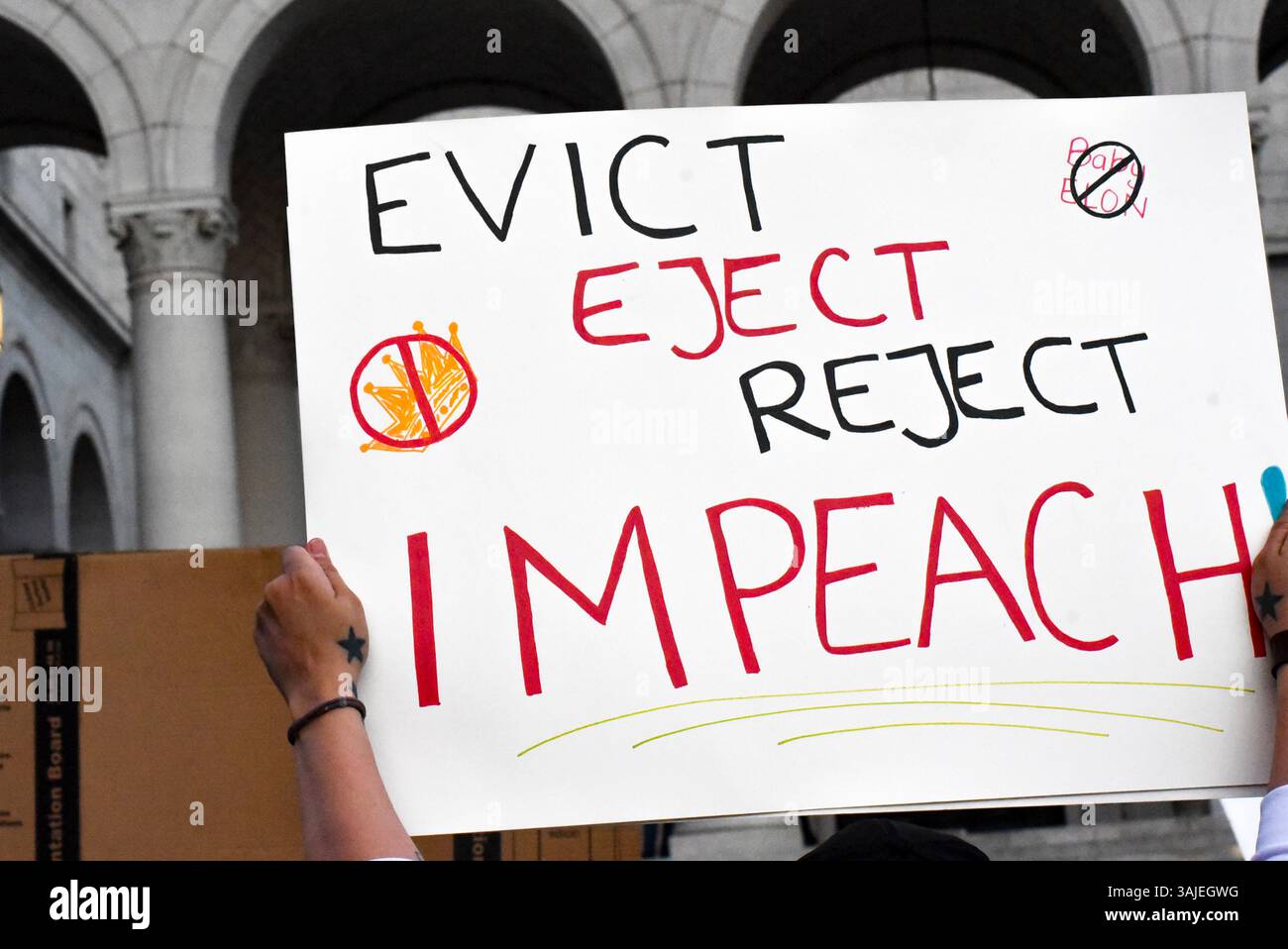 April 5, 2025, Los Angeles, Califronia, USA: A protester holds up a ...