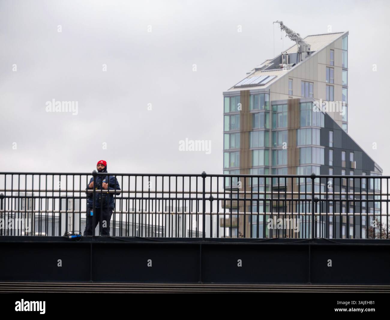 Security guard on patrol keeping watch at Coal Drop Yard, Kings Cross ...