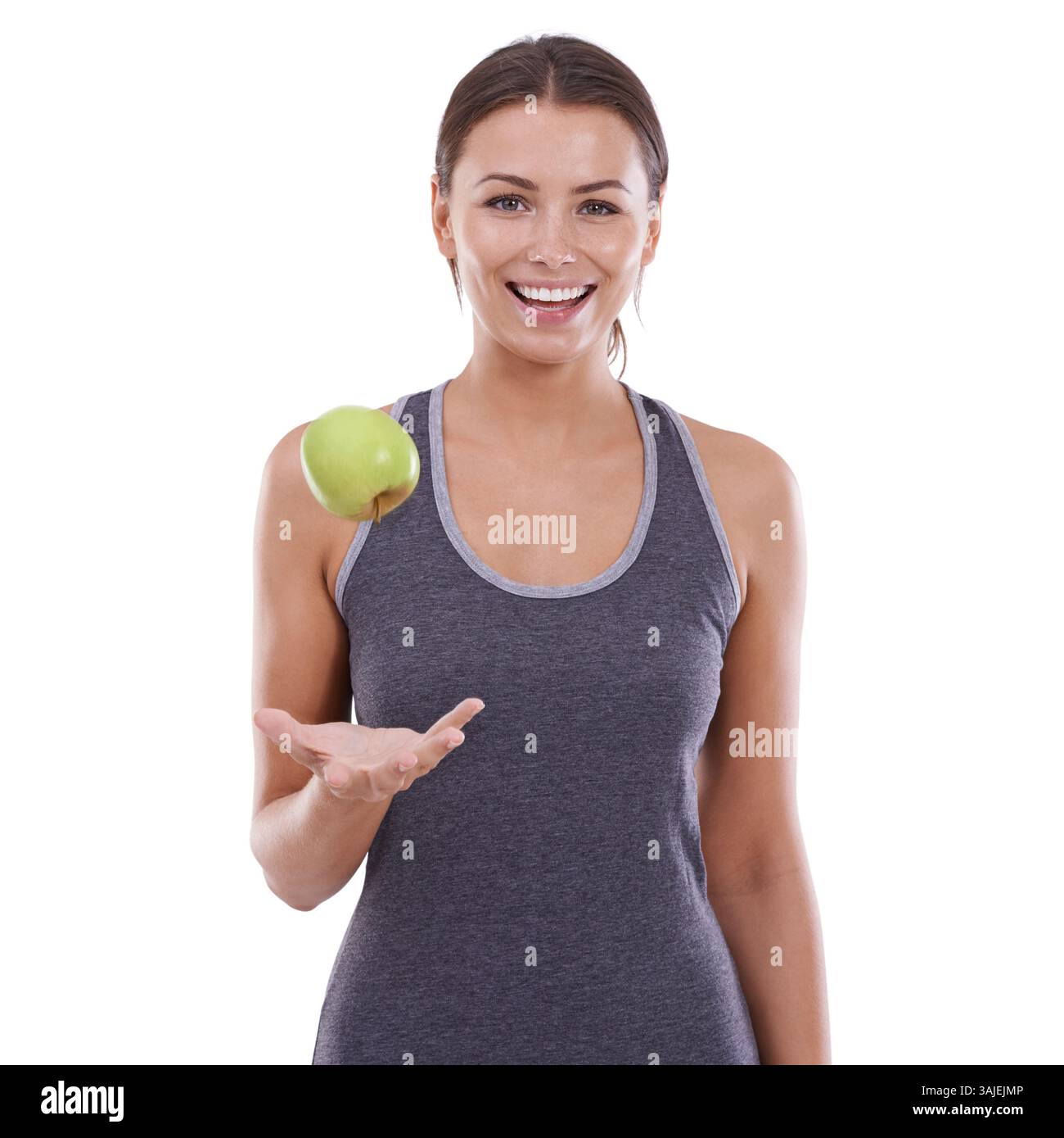 Studio, model and apple in portrait for detox, fitness and healthy food ...
