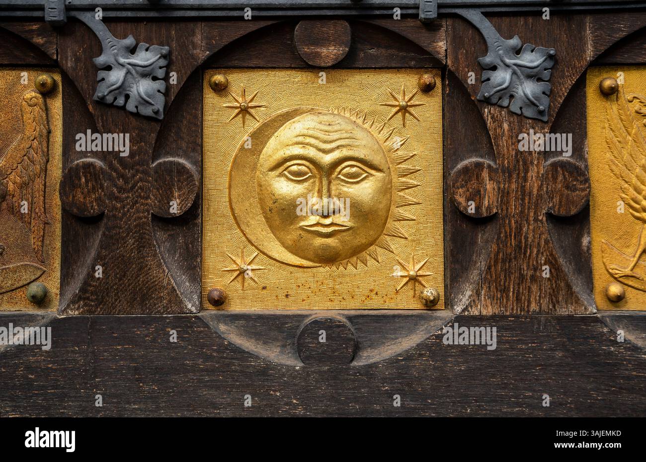 Sculpted portal with sun and moon, entrance of the basilica of the ...