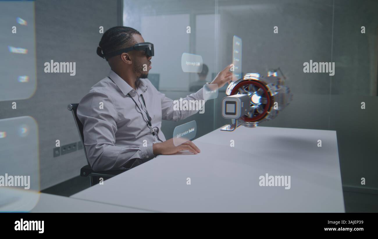 Futuristic Office: African American Professional Wearing Virtual Reality Headset to Visualize 3D ...