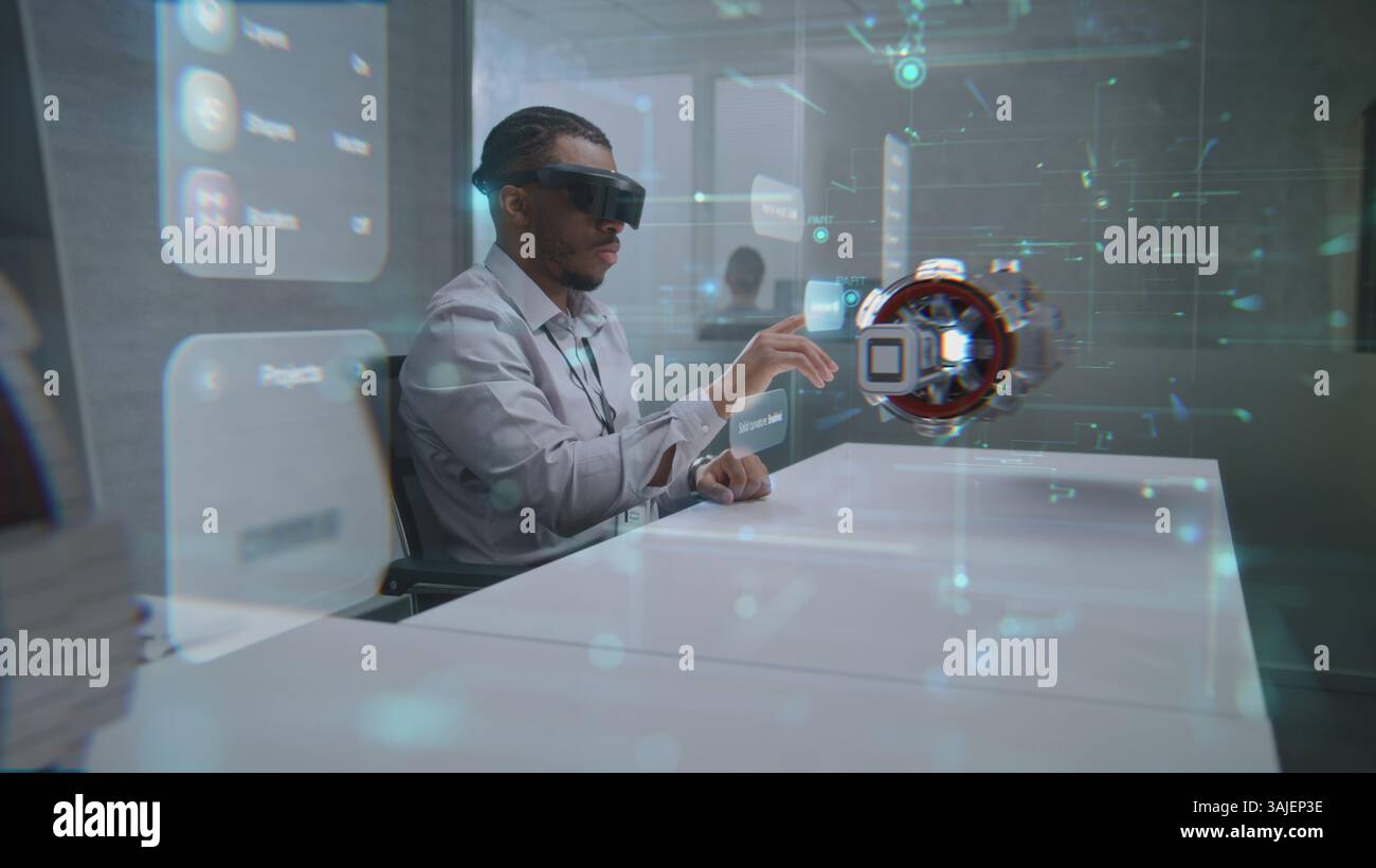 Futuristic Office: African American Professional Wearing Virtual Reality Headset to Visualize 3D ...