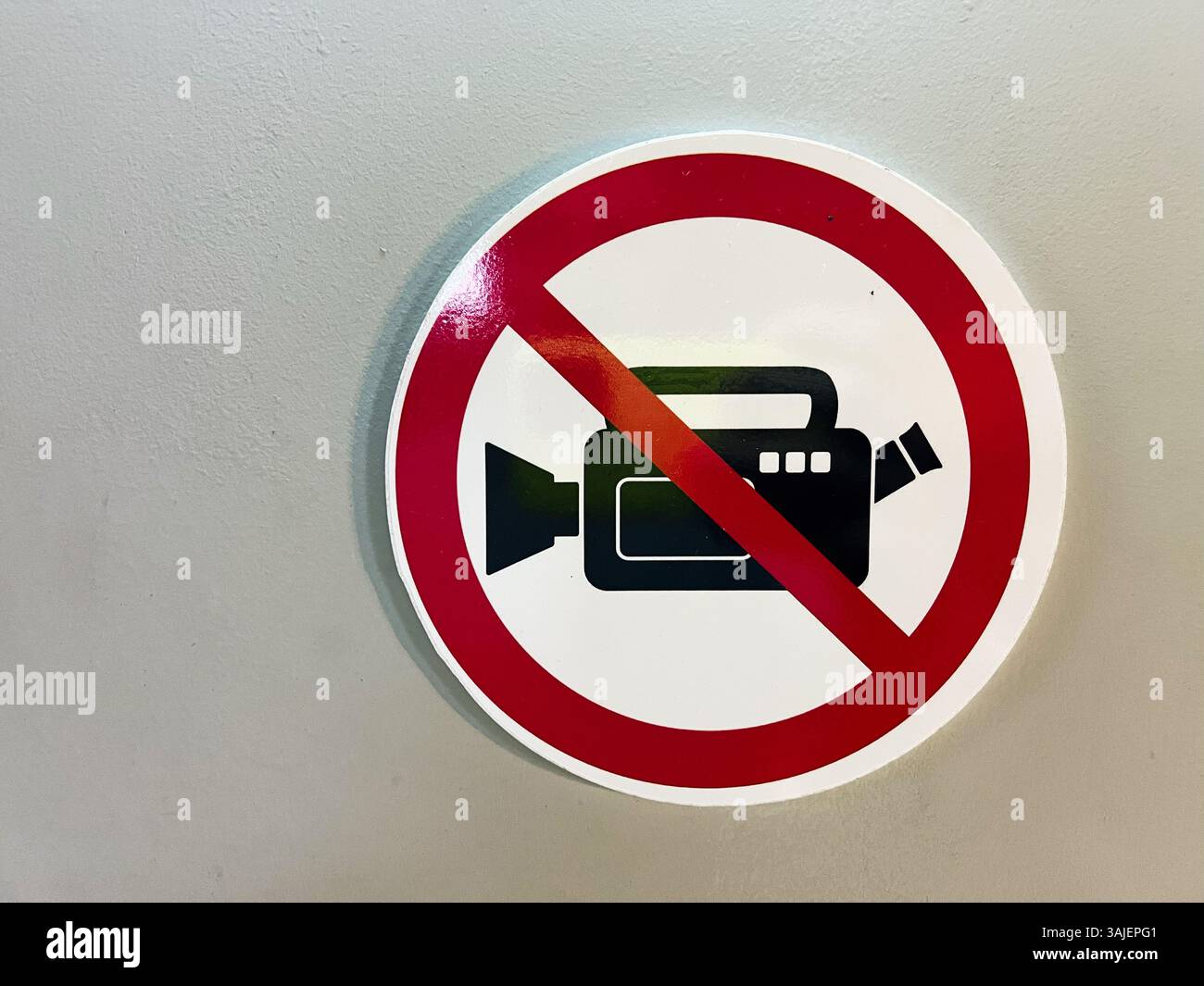 Prohibition sign against video recording displayed on a wall surface ...