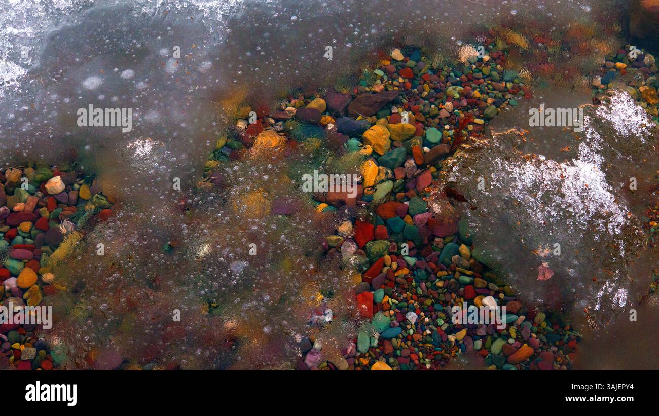 multi colored rocks Lake McDonald in Glacier National Park , wyoming ...