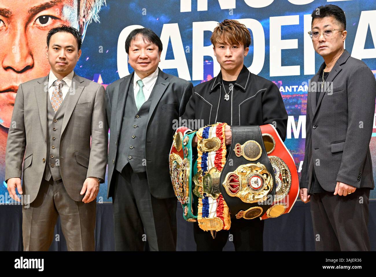 Undisputed super-bantamweight world champion Naoya Inoue, second right ...