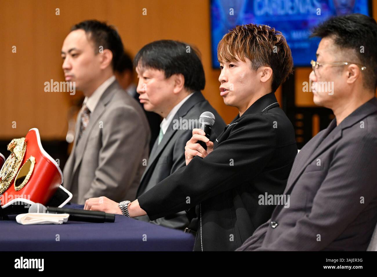 Undisputed super-bantamweight world champion Naoya Inoue, second right ...