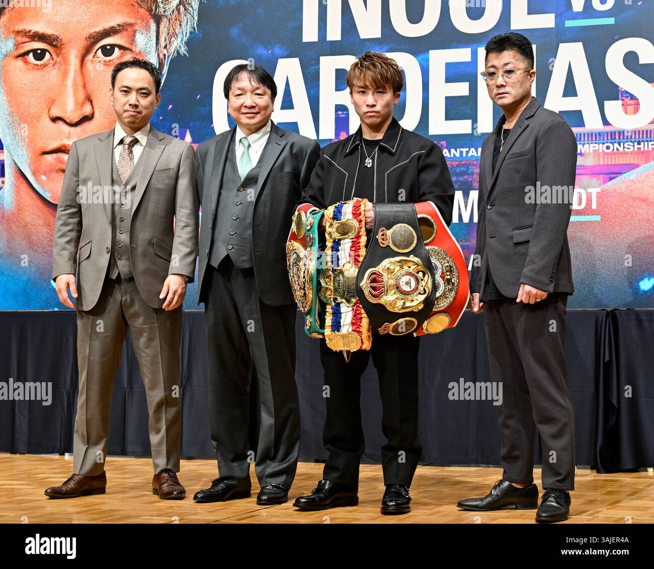 Undisputed super-bantamweight world champion Naoya Inoue, second right ...