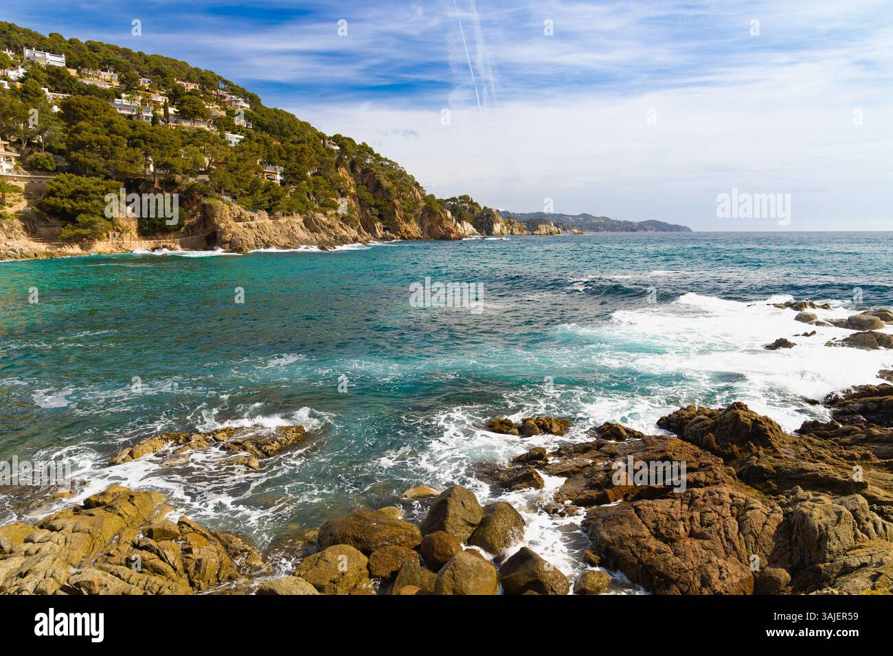 View from the coastal path near Blanes: rugged cliffs, turquoise sea ...