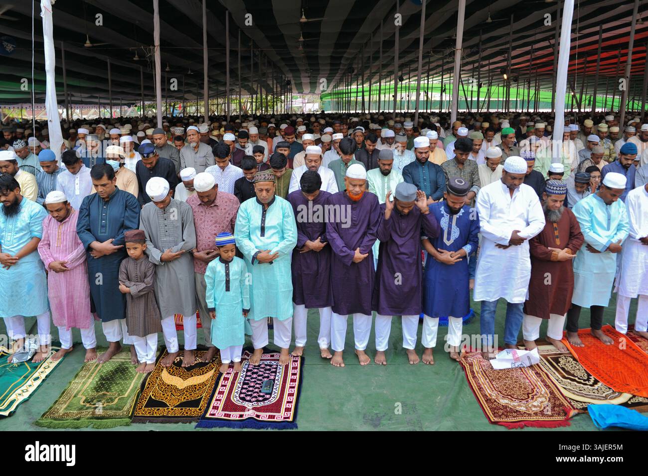 Muslims gather at Jamiatul Falah Mosque to offer the Eid-ul-Fitr prayer ...