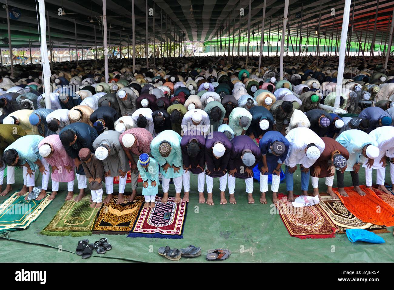 Muslims gather at Jamiatul Falah Mosque to offer the Eid-ul-Fitr prayer ...
