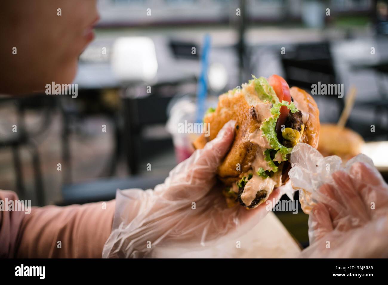 Close person hands in gloves hi-res stock photography and images - Alamy