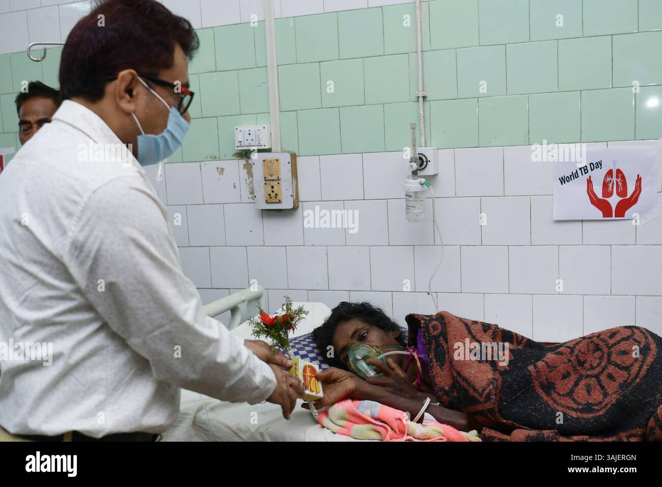 TB (Tuberculosis) patients are presented with flowers and sweets by ...