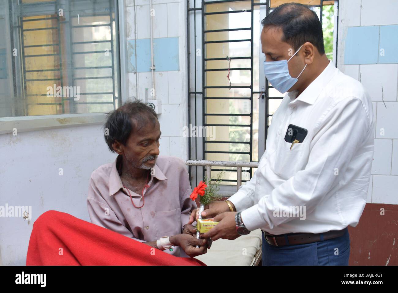 TB (Tuberculosis) patients are presented with flowers and sweets by ...
