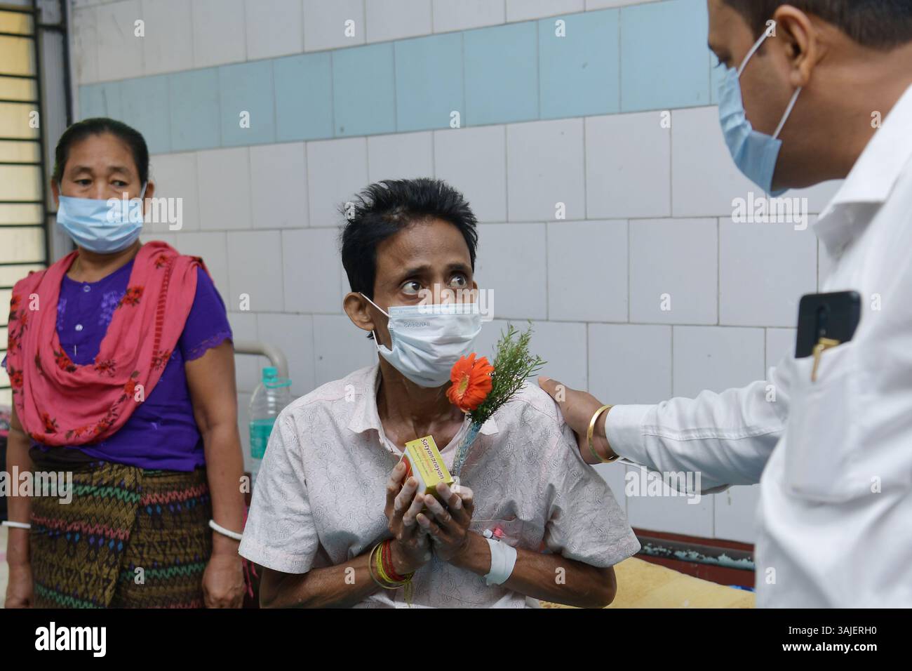 TB (Tuberculosis) patients are presented with flowers and sweets by ...