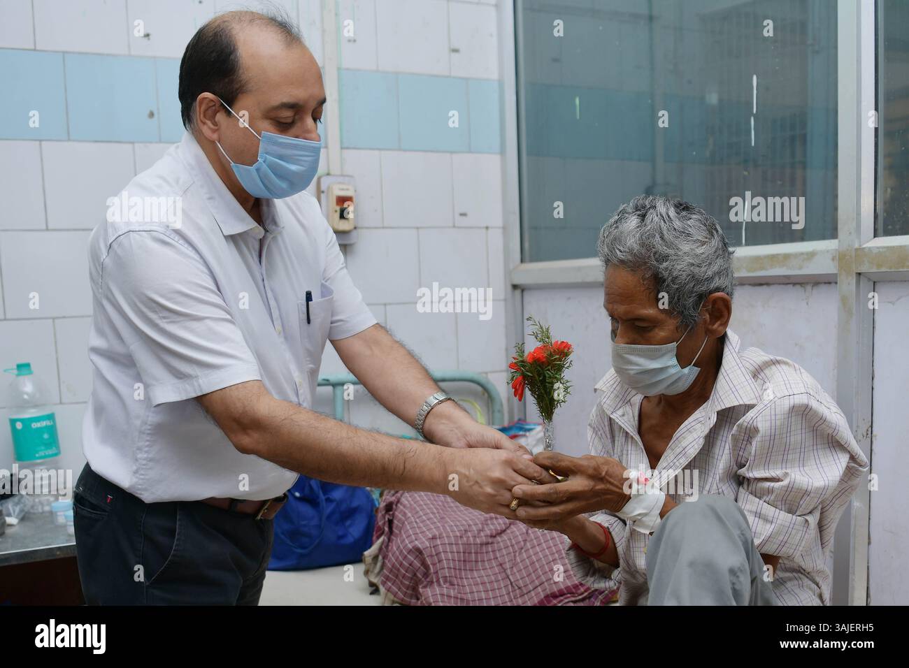 TB (Tuberculosis) patients are presented with flowers and sweets by ...