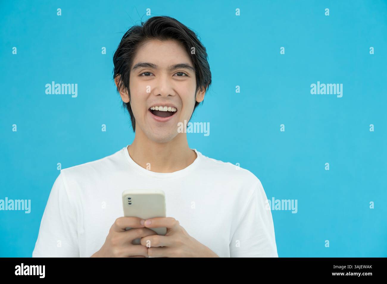 Asian handsome man exited surprise face expression . Male feels shocked ...