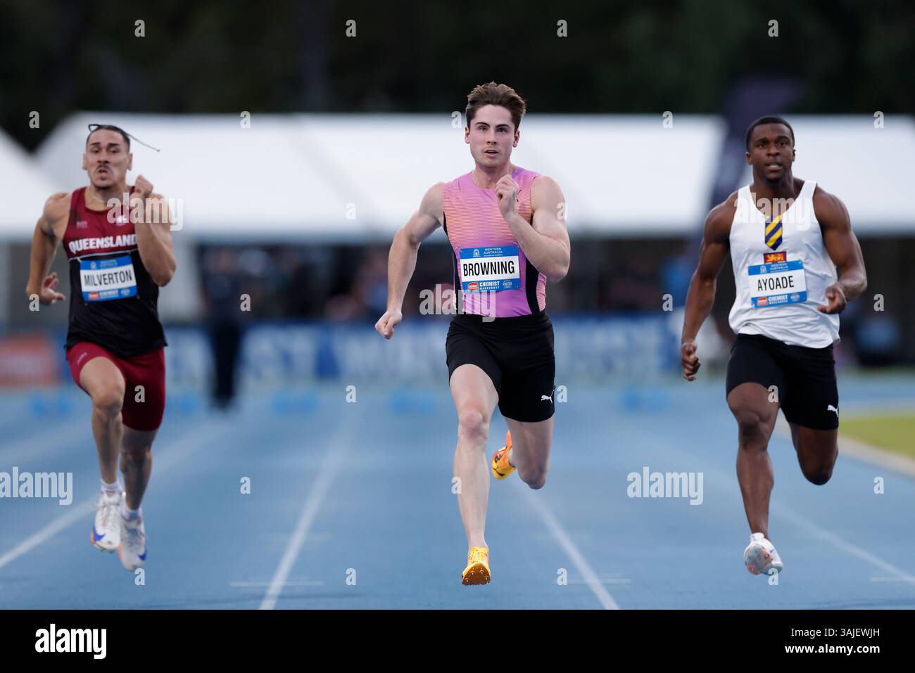 Rohan Browning (centre) of New South Wales crosses the line to win the ...