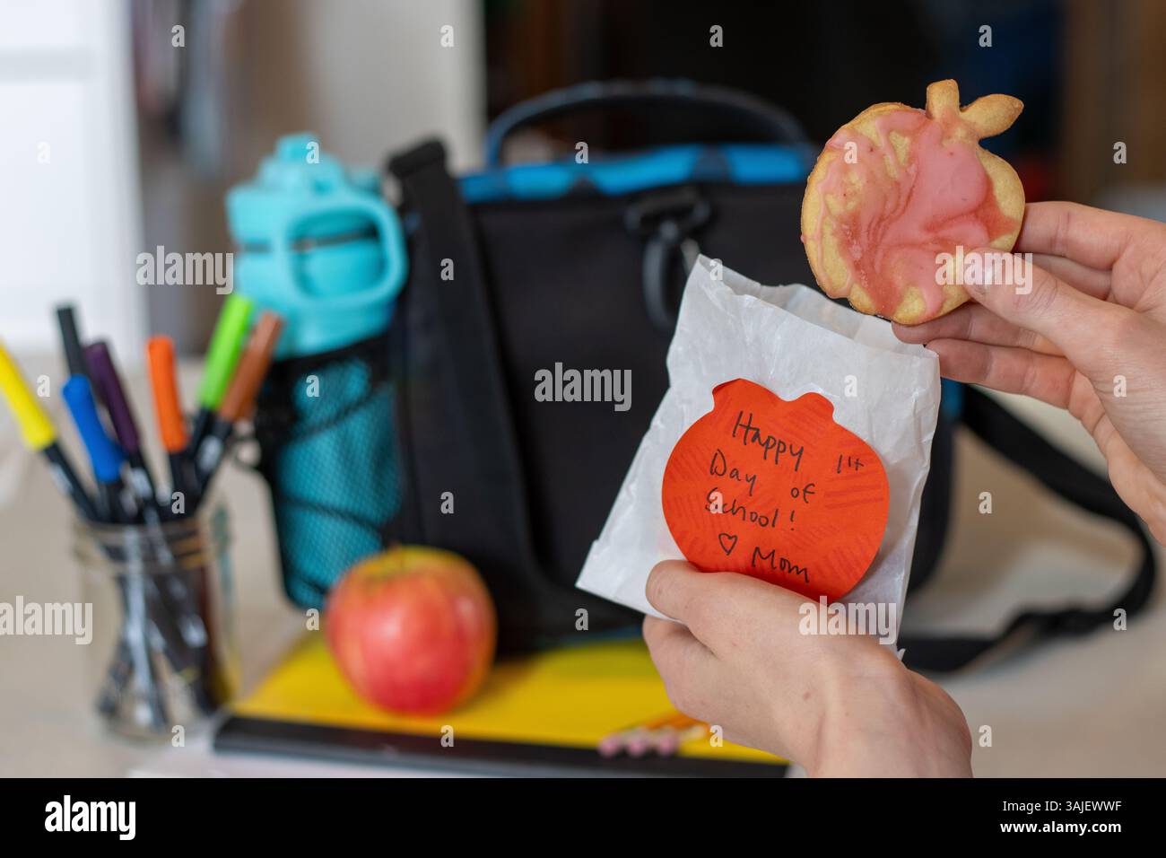 First day of school lunch with apple-shaped cookie and sweet note Stock ...
