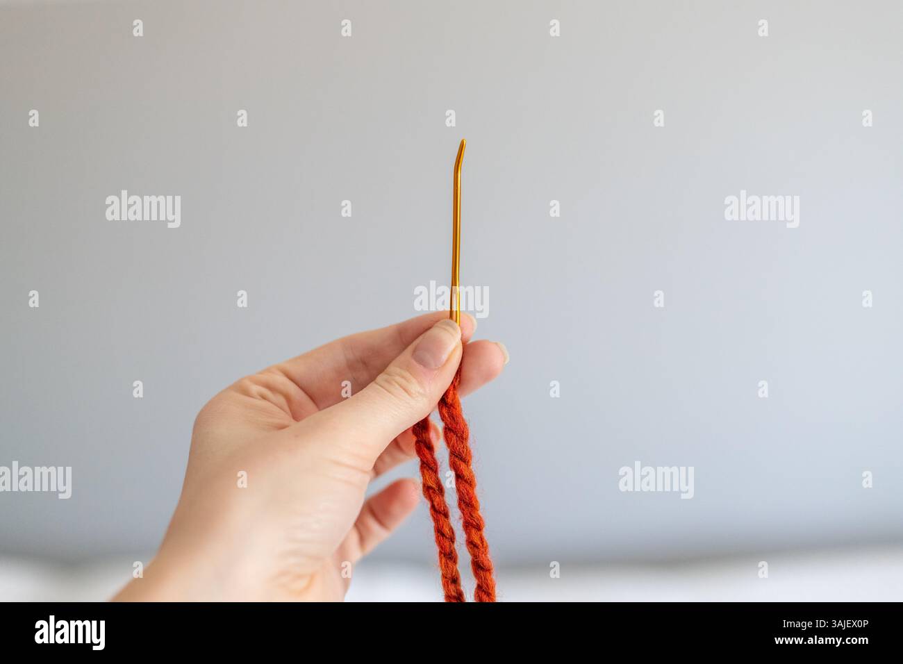 Close up hands threading hi-res stock photography and images - Alamy