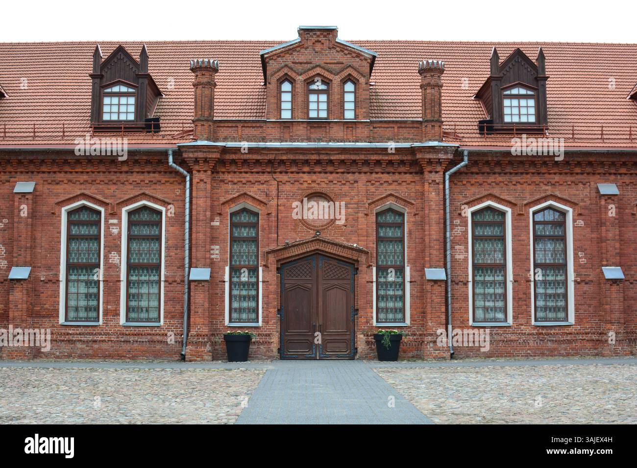 Raudondvaris manor castle stables facade fragment. Entrance to the big ...