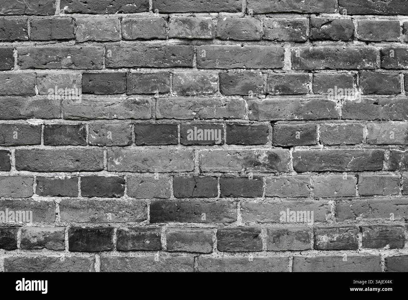 Wall background of dark grey bricks. Grey brick wall background. Dark ...
