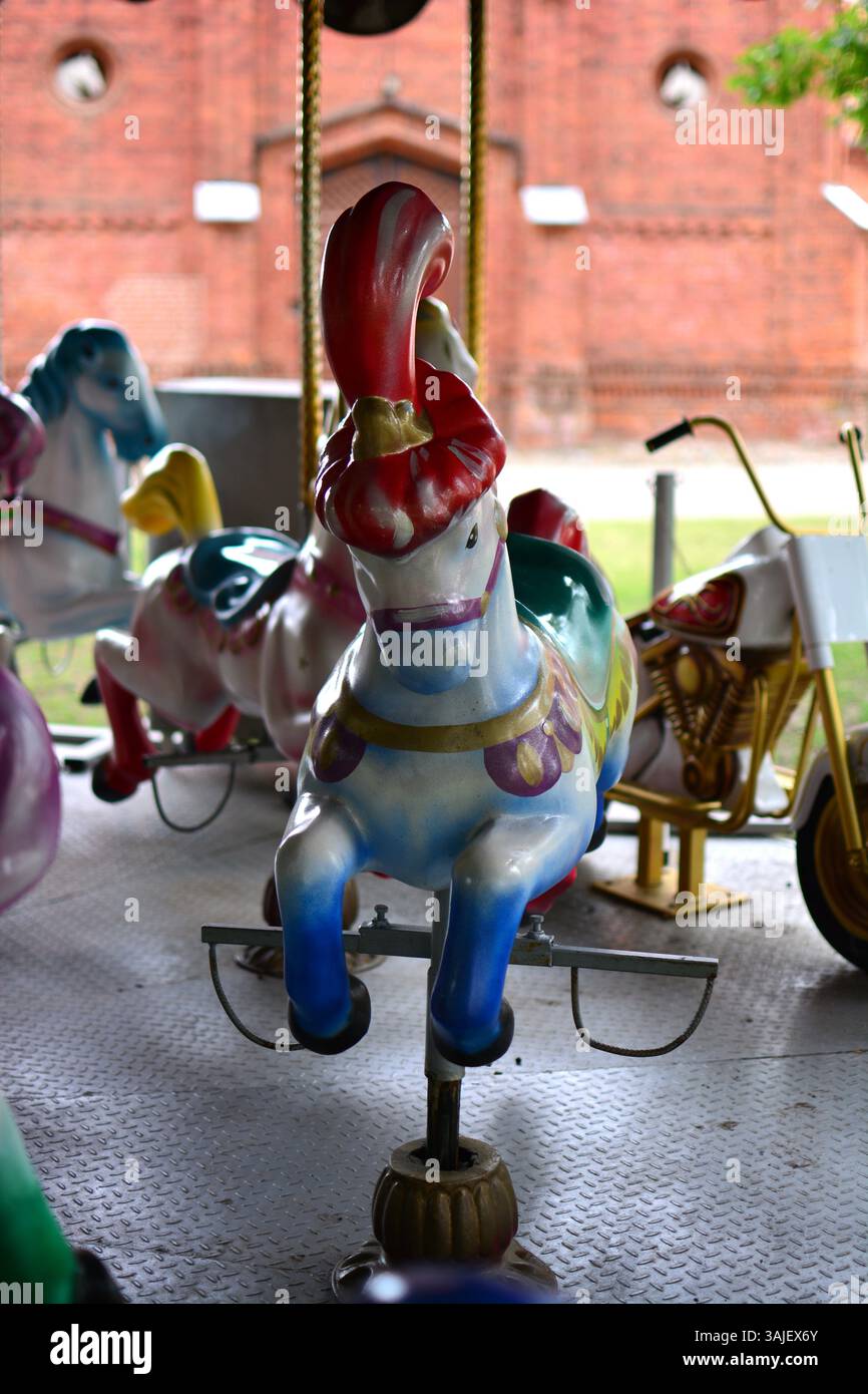 Vintage horse ride carousel fragment. Retro kids play carousel ...