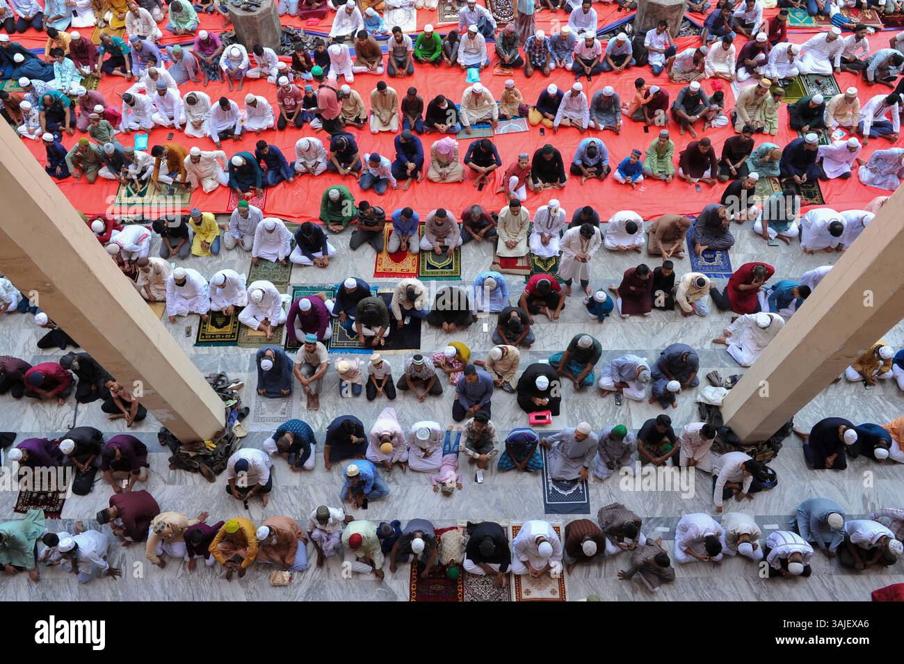 A Muslim attends Jumatul Bidah, the last friday prayer of the month of ...