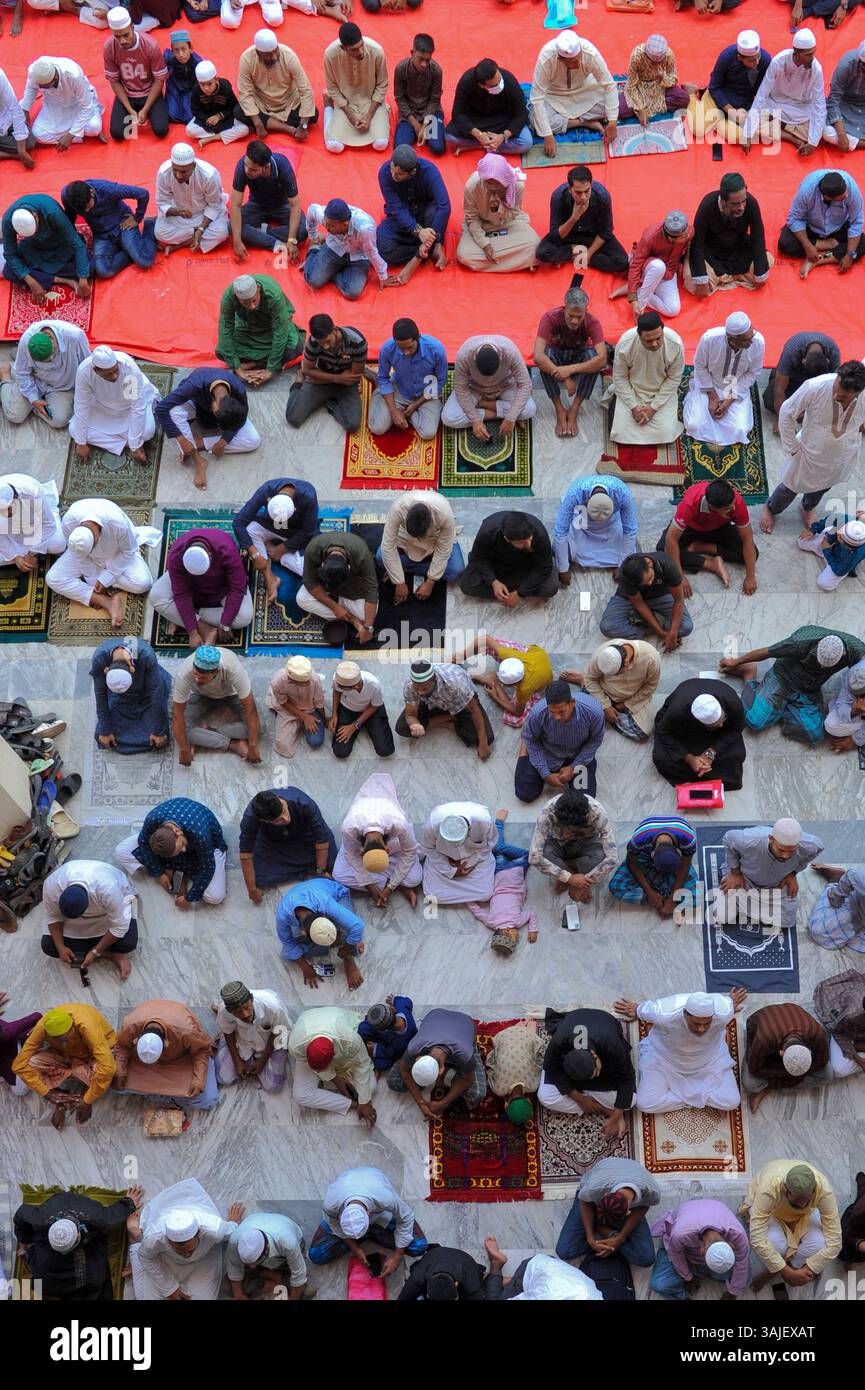 A Muslim attends Jumatul Bidah, the last friday prayer of the month of ...