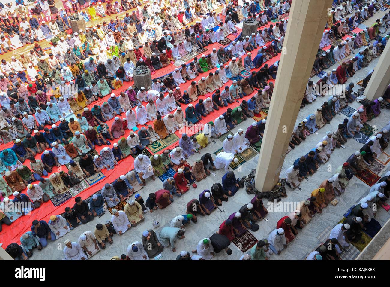 A Muslim attends Jumatul Bidah, the last friday prayer of the month of ...