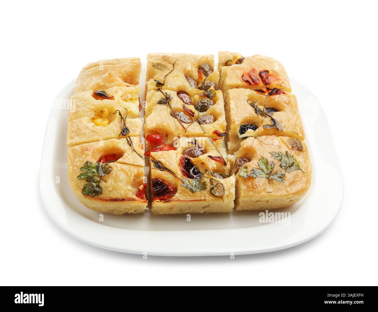 Cut delicious focaccia with flowers made of vegetables isolated on ...