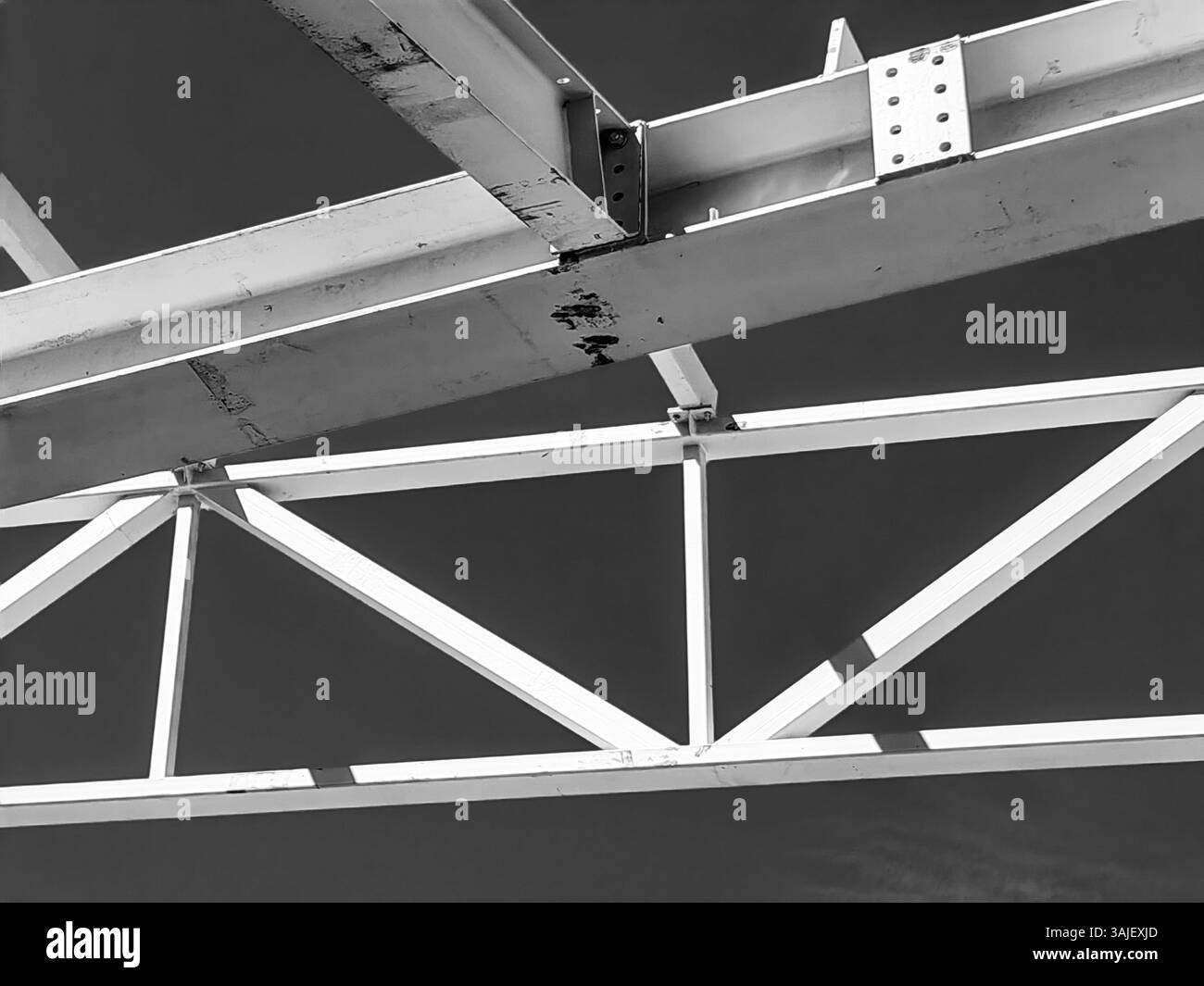 Steel Skeleton: Rooftop Structure in Sunlight Stock Photo - Alamy