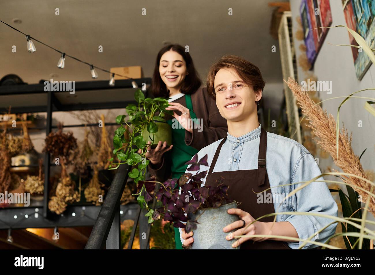 Creative couple joyfully connect, sharing their passion for plants and ...