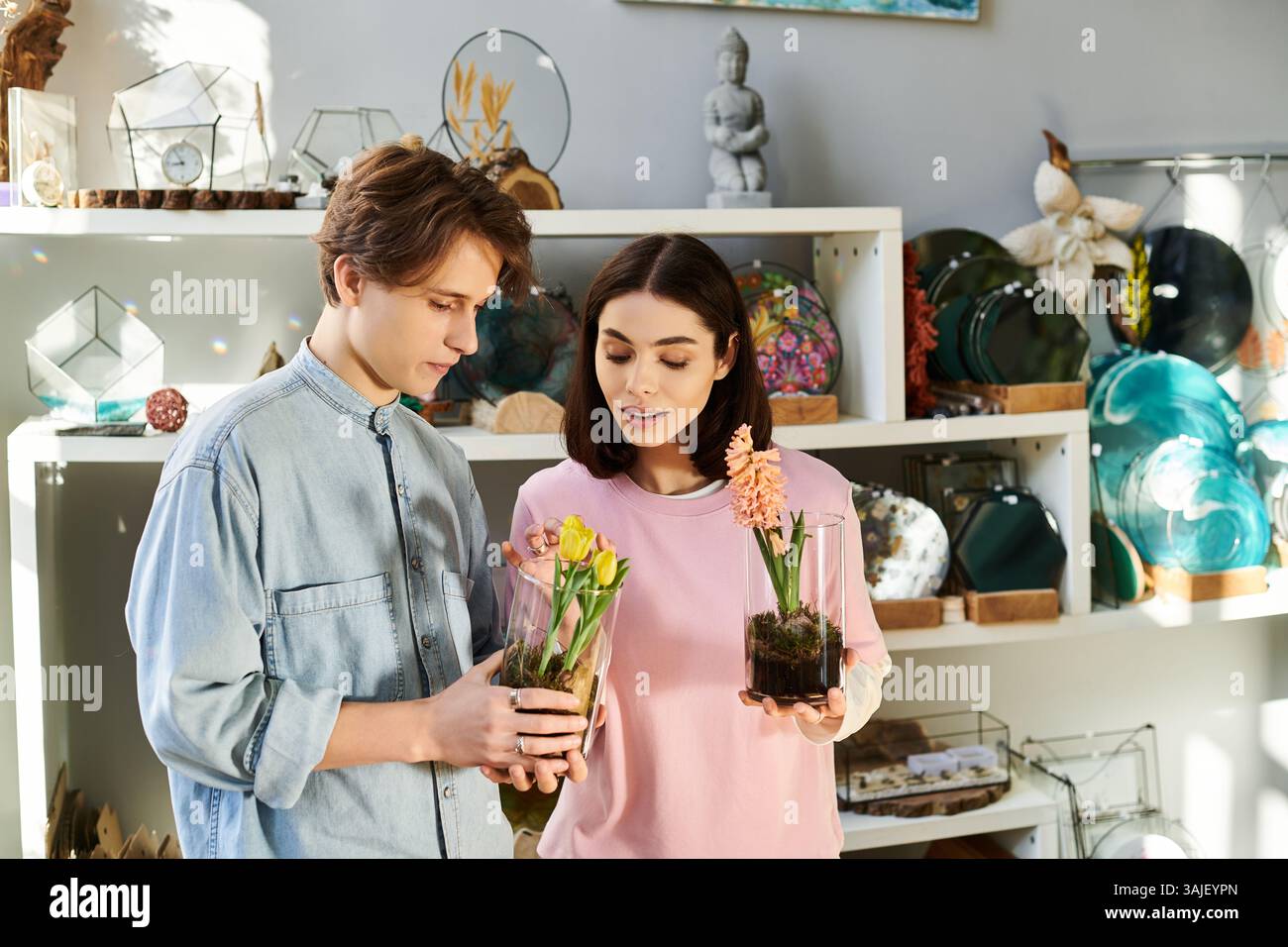 Two young artists share ideas on floral arrangements amid their art ...