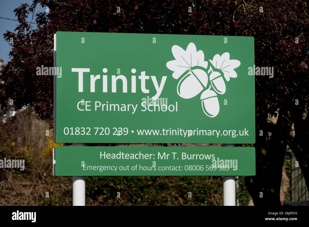 Trinity CE Primary School sign, Aldwincle, Northamptonshire, England ...