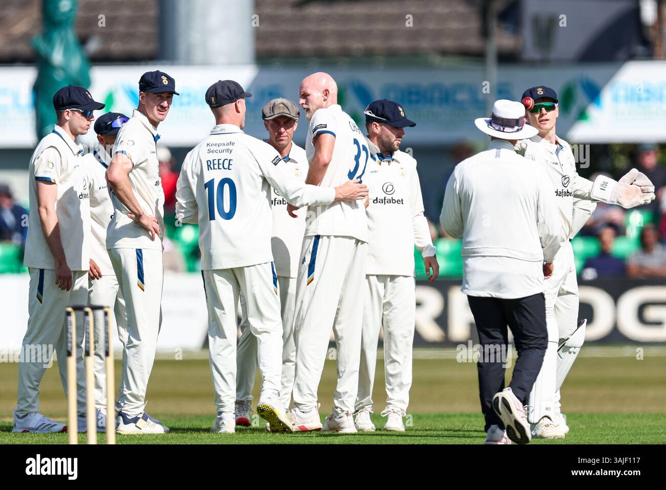 #10, Luis Reece of Derbyshire congratulates #32, Zak Chappell for ...