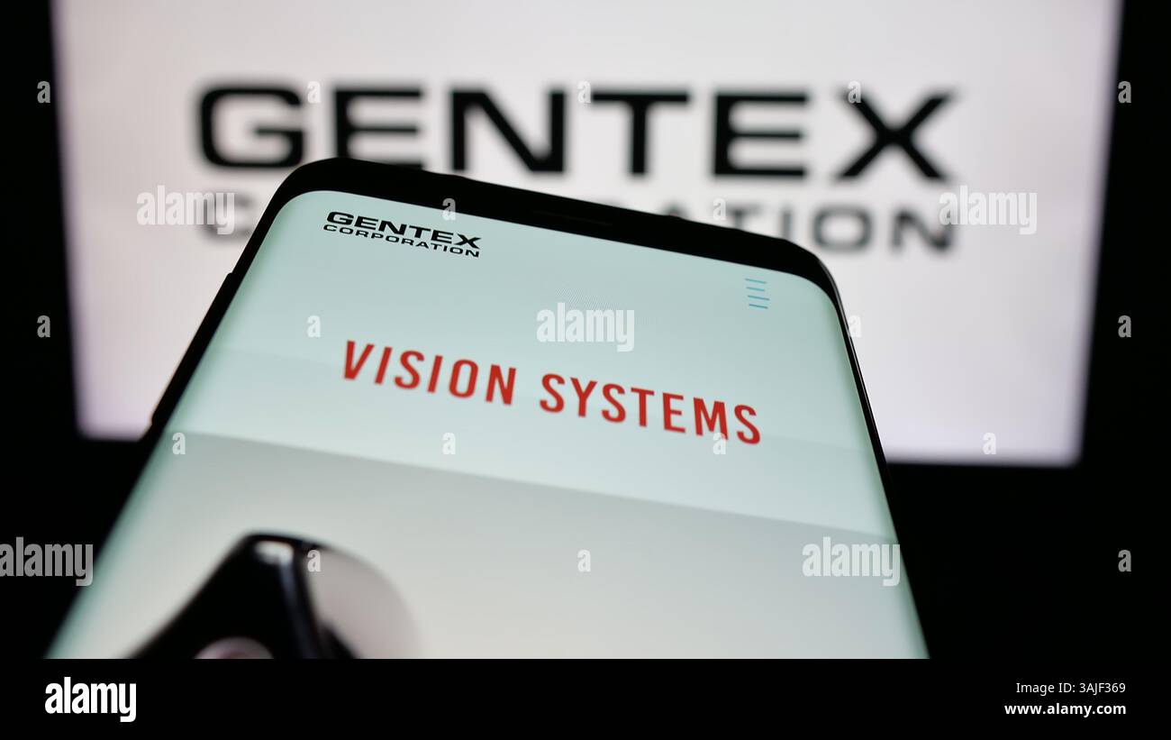 In this photo illustration, a mobile phone with the website of US ...