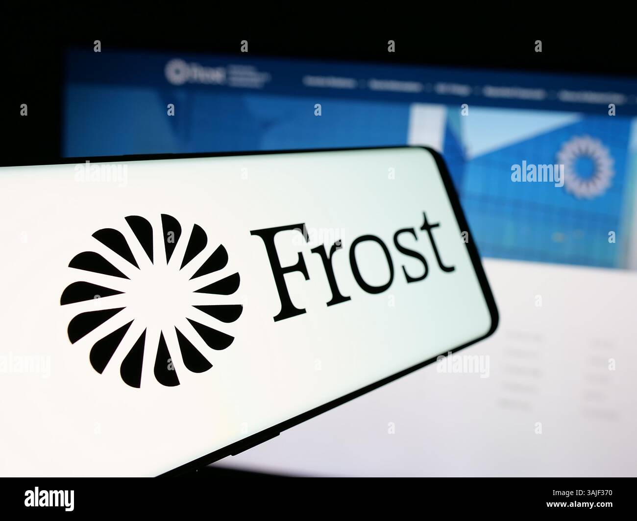 In this photo illustration, a smartphone with the logo of American ...