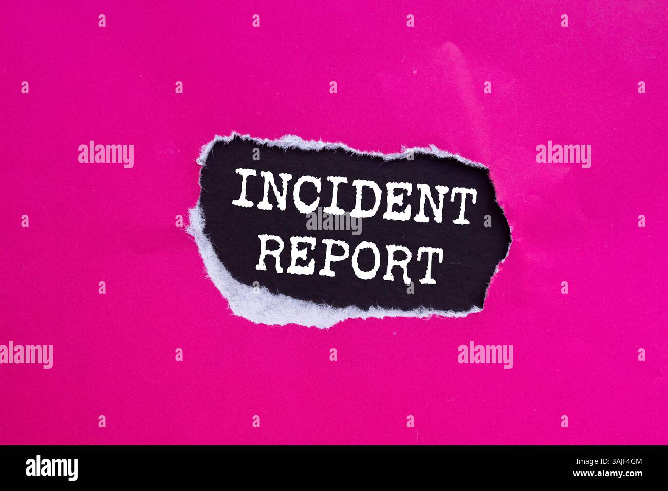 Incident report message written on ripped torn pink paper on black background. Conceptual ...