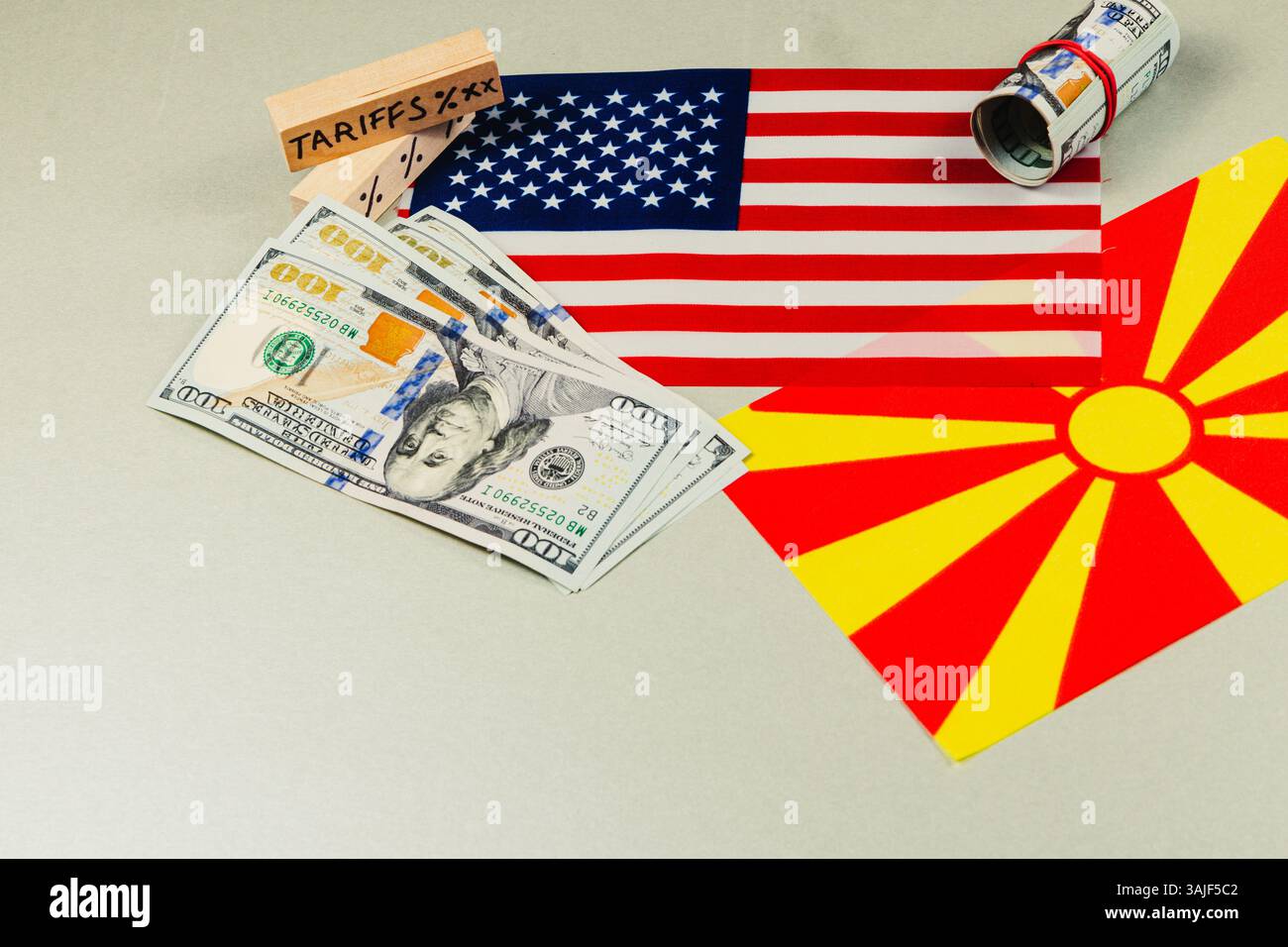 Financial negotiations involve U.S. currency and national flags of the ...