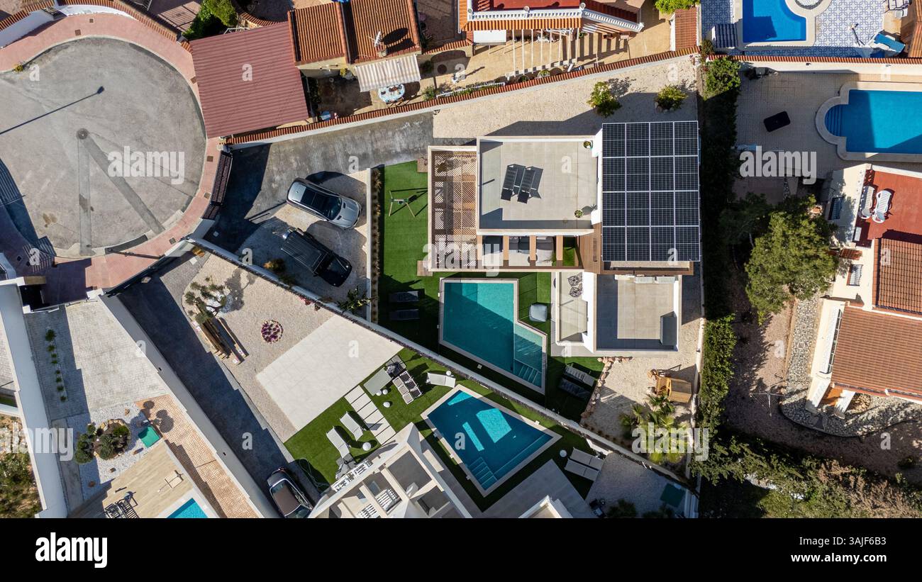 High-altitude drone image capturing a modern residential area with ...